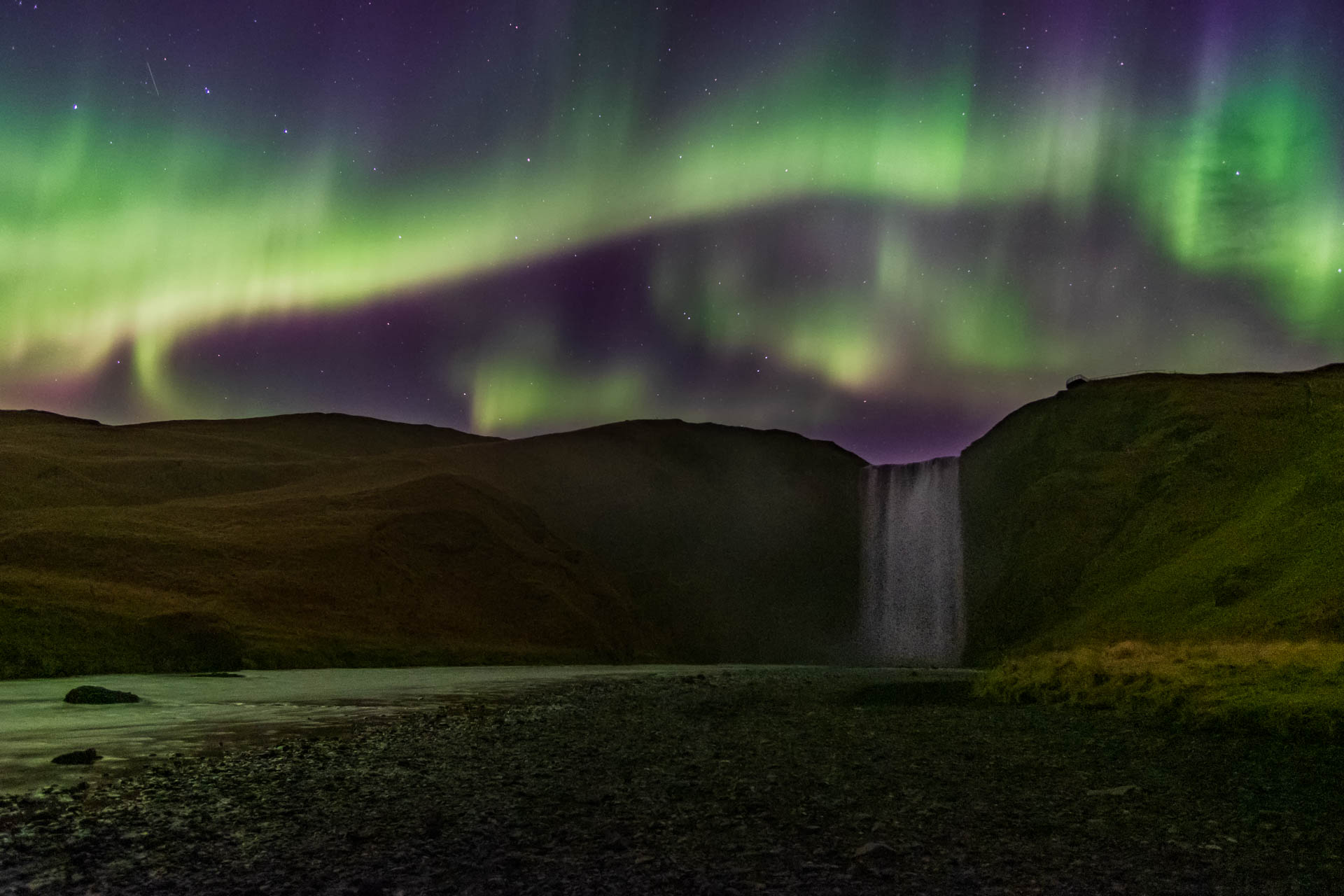 Aurora Borealis over Skogafoss waterfall in Iceland - Alexios Ntounas ...
